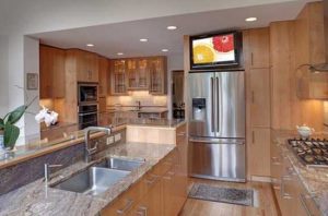 7 Modern Kitchen Design Trends Stylishly Incorporating TV sets into ...