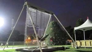 Fun Backyard Idea Blending Swing Design with Sensor Controlled Waterfall