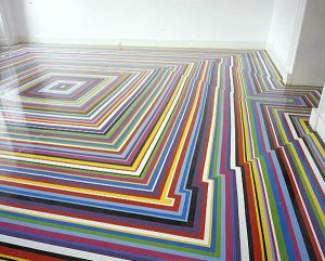 Modern Floor Decoration with Tape Strips Creating Cool Rainbow Design