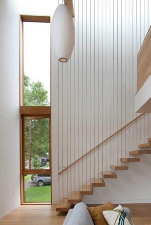 Modern House Design with Warm Wooden Interiors and Modernist Feel