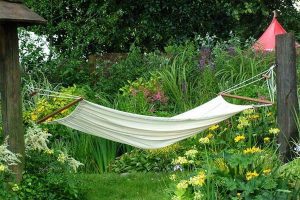 33 Hammock Ideas Adding Cozy Accents to Outdoor Home Decorating