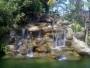 21 Waterfall Ideas to Add Tranquility to Rock Garden Design
