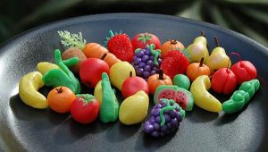 Sweet Cake Decoration with Marzipan Fruits, Flowers, and Fun Designs