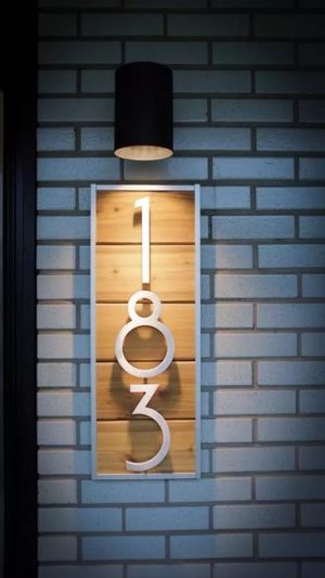 How to Beautify House Number Signs with Plants and Outdoor Lights