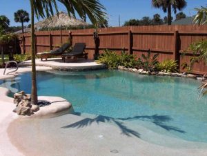 Beach Style Pool Designs Creating a Lake Effect in Modern Yards