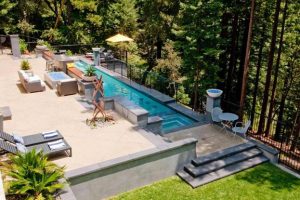 30 Outdoor Swimming Pools, Spectacular Water Features Tucked into Hillsides