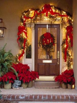 Outdoor Christmas Decorating with Green Garlands and Winter Holiday Wreaths