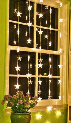 Star Power of Christmas Lights to Brighten Up Window Decorating