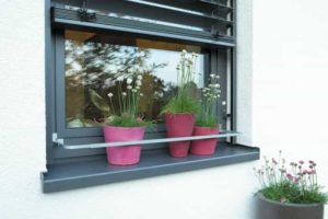 Window Planters with Beautiful Flowers Add European Charm to Exterior ...