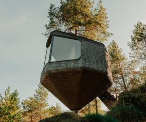 Striking Woodnest Treehouse Design Blending with Surrounding Forest